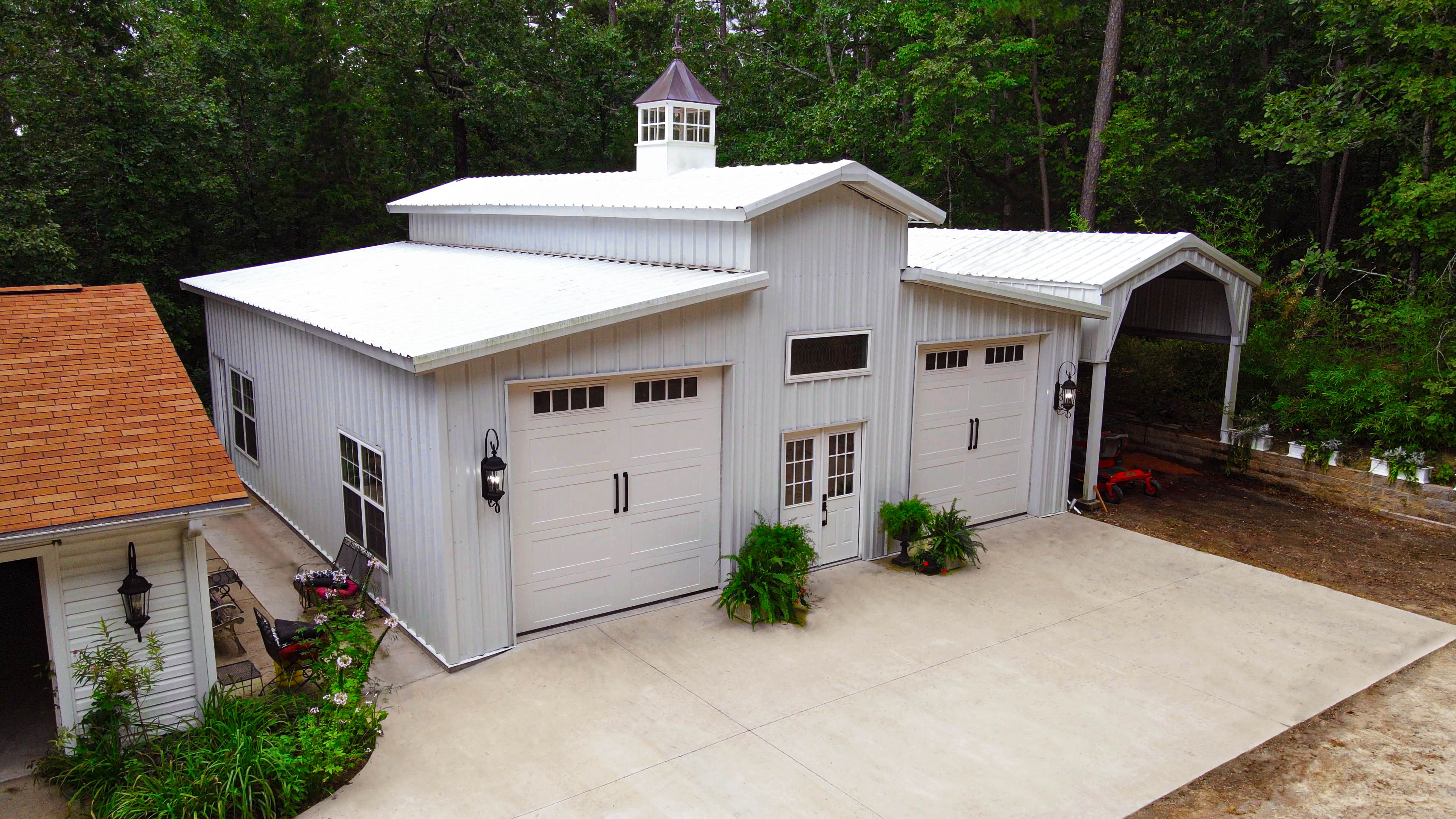 Evergreen Grounds - White Storage Building - Mueller, Inc